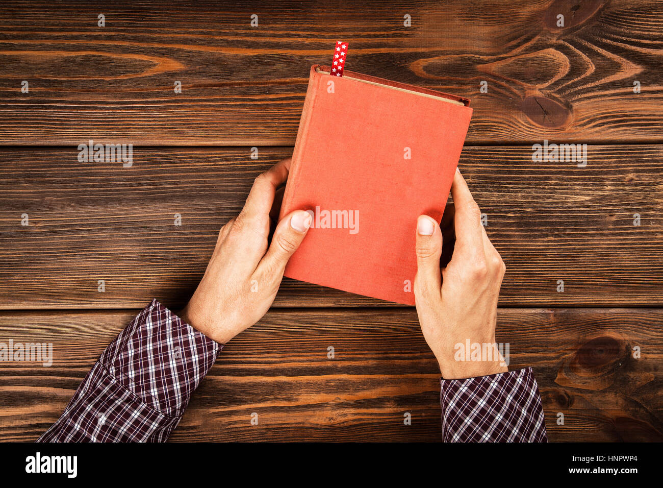 Reading a book Stock Photo - Alamy