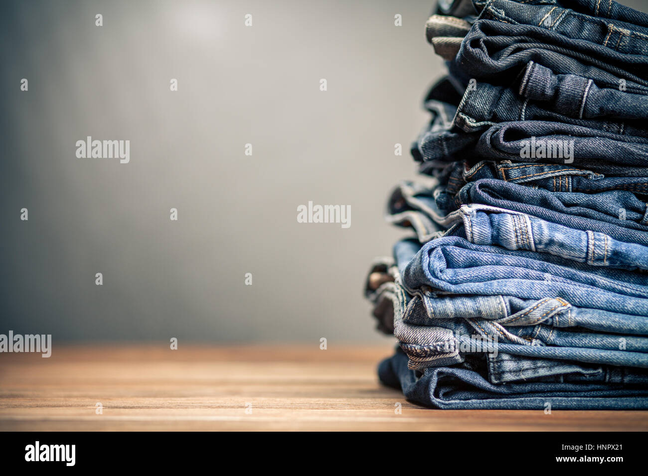 Pile of jeans Stock Photo - Alamy