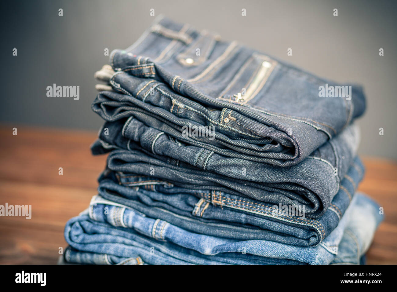 Pile of jeans Stock Photo - Alamy