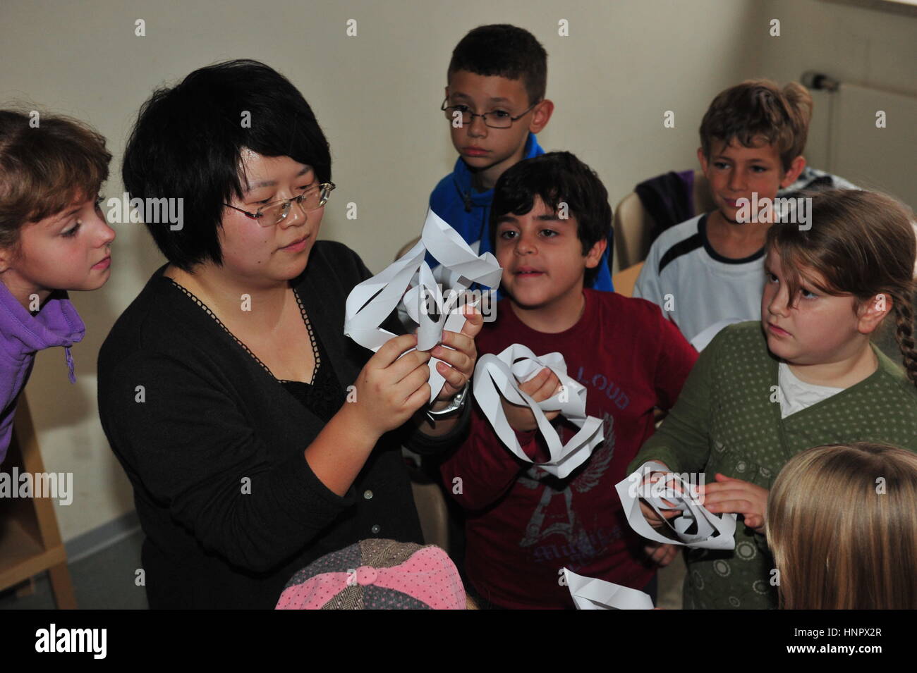 Child learning calligraphy chinese hi-res stock photography and images ...