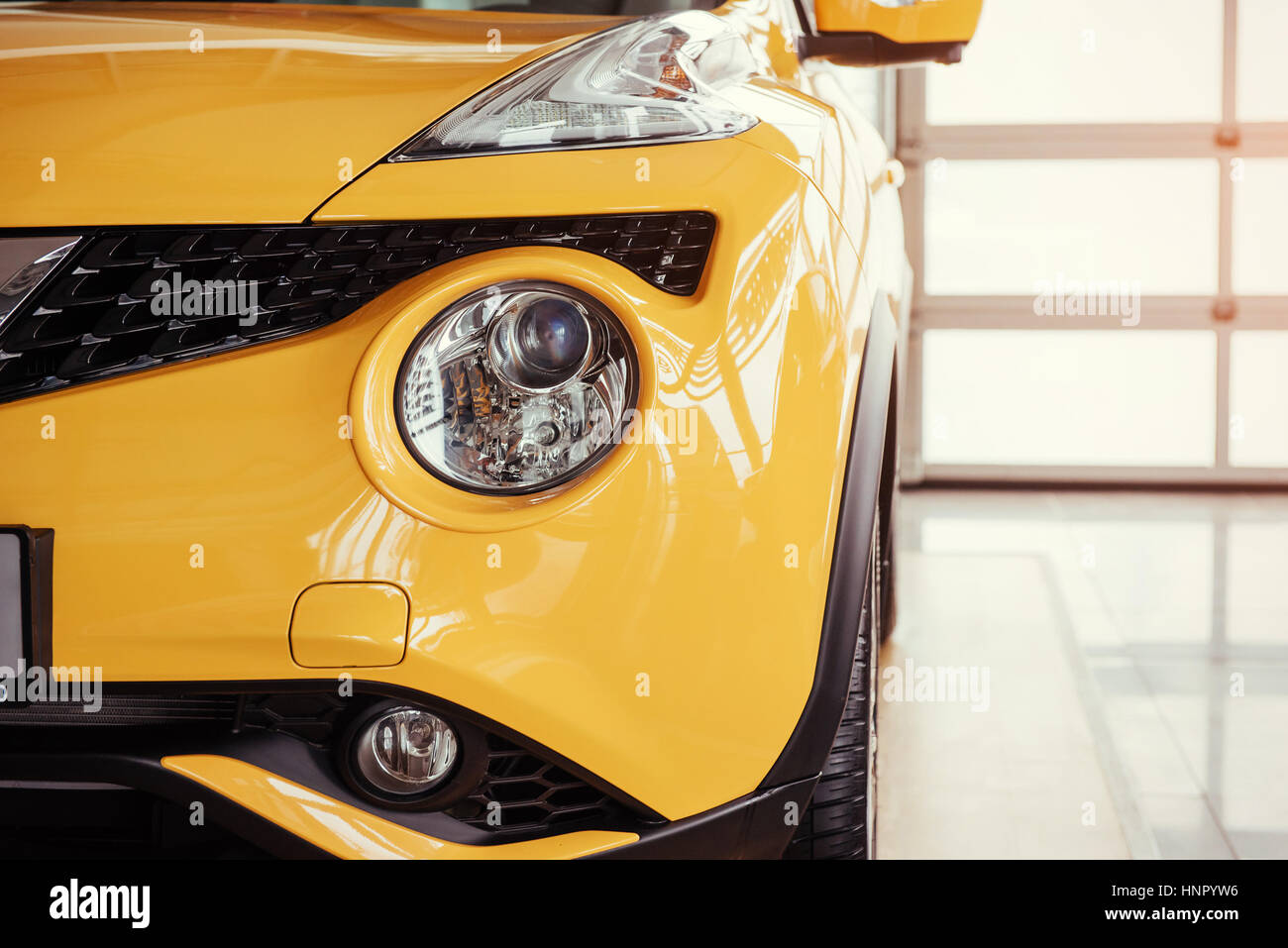 Headlights and hood of sport car Stock Photo - Alamy