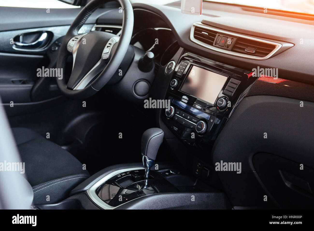 Modern car interior dashboard and steering wheel Stock Photo - Alamy