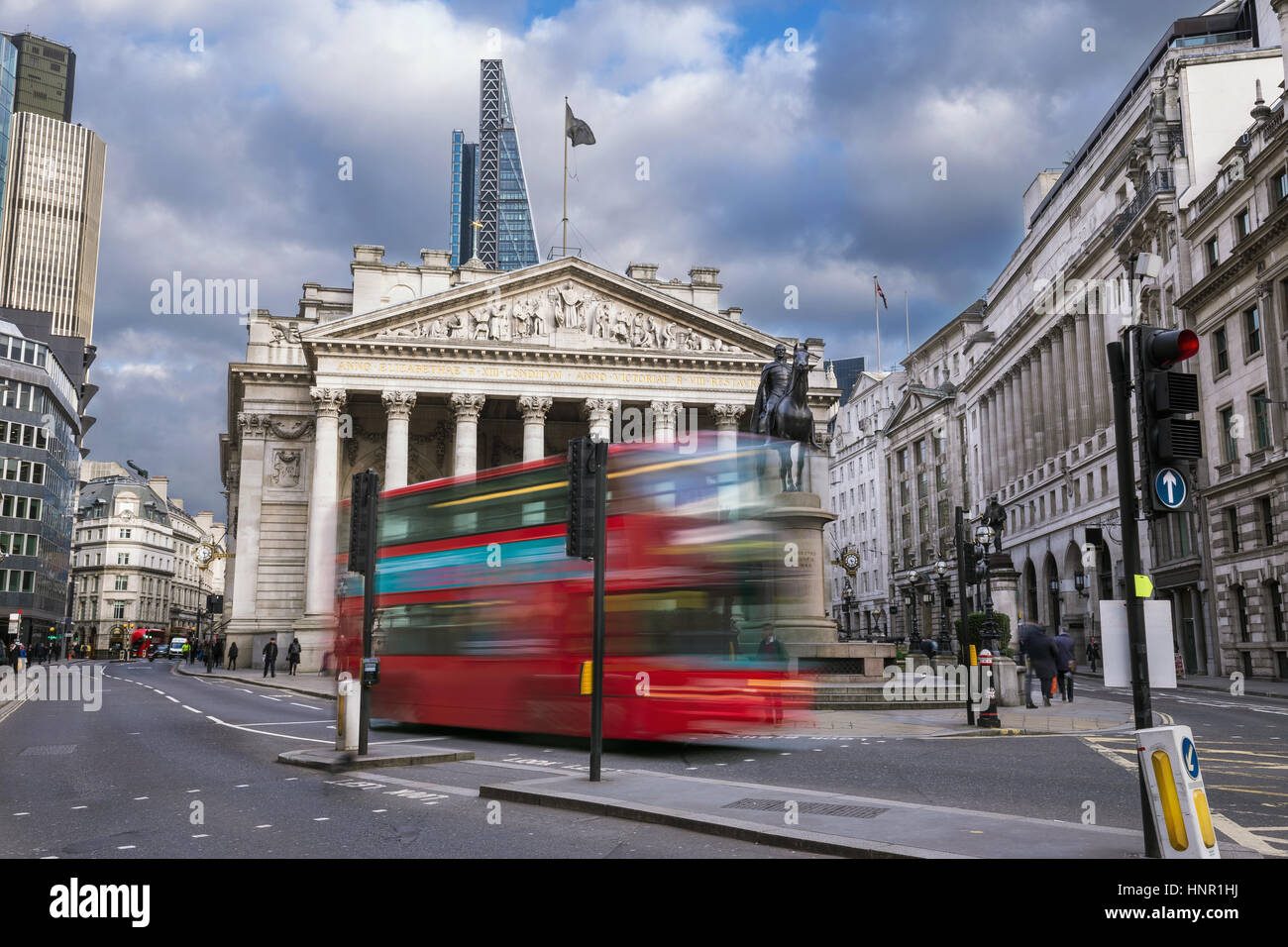 London, England - The Royal Echnage building with moving red double ...