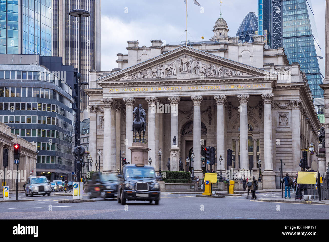 London, England - The Royal Exchange building with moving traditional ...