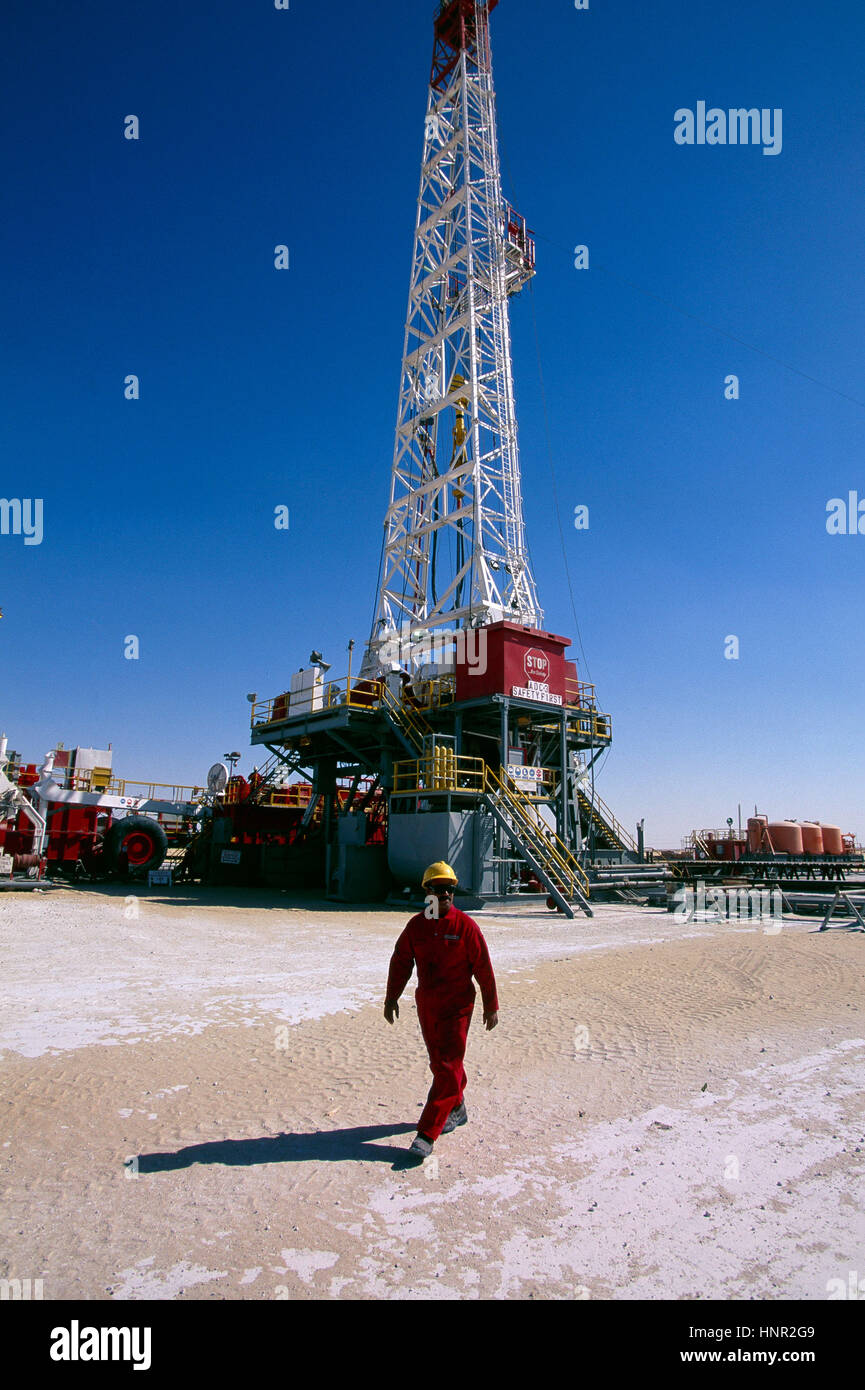 Drilling for oil in the Saudi desert near Abqaiq, by the Arabian ...