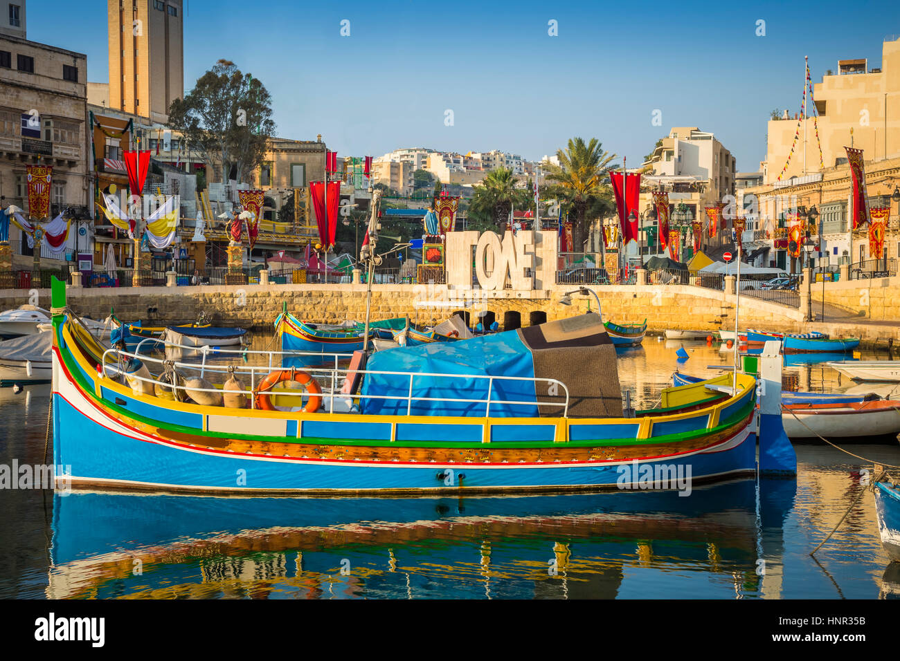 St.Julian's, Malta - Traditional colorful Luzzu fishing boat at Spinola ...
