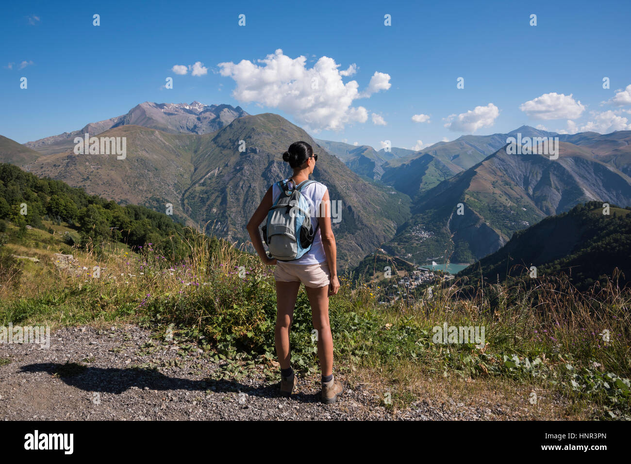 Woman trekking in the Alps, summer activity, France Stock Photo - Alamy