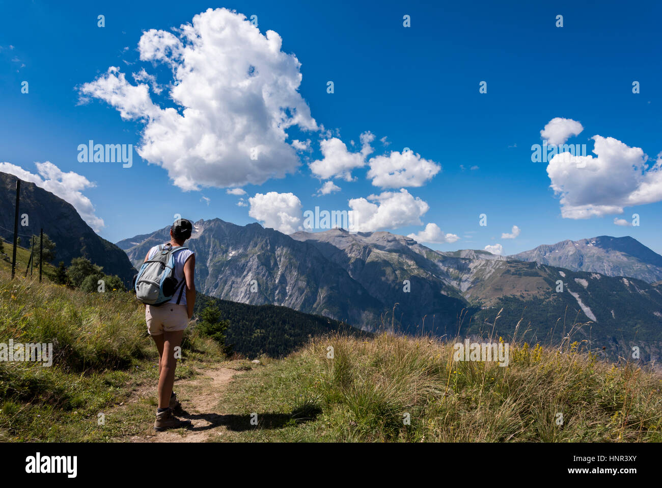 Woman trekking in the Alps, summer leisure, sport and hobbies, France ...