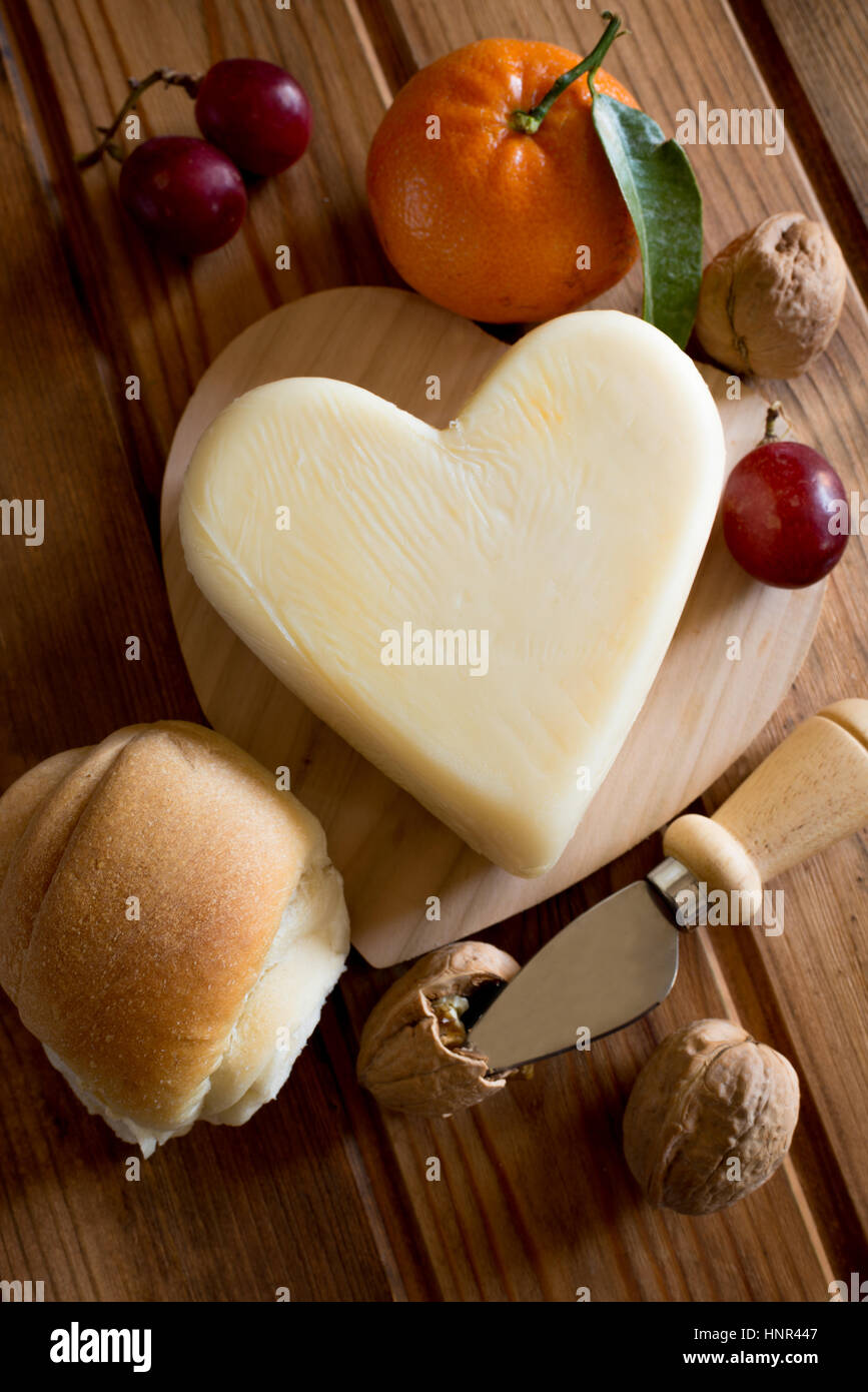 Form heart cheese symbol hi-res stock photography and images - Alamy