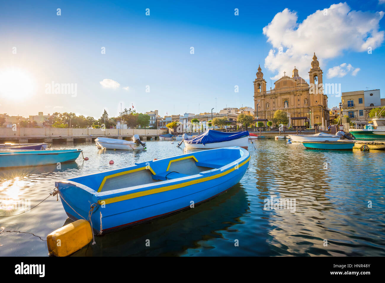 Msida, Malta - Blue traditional fishing boat with the famous Msida ...