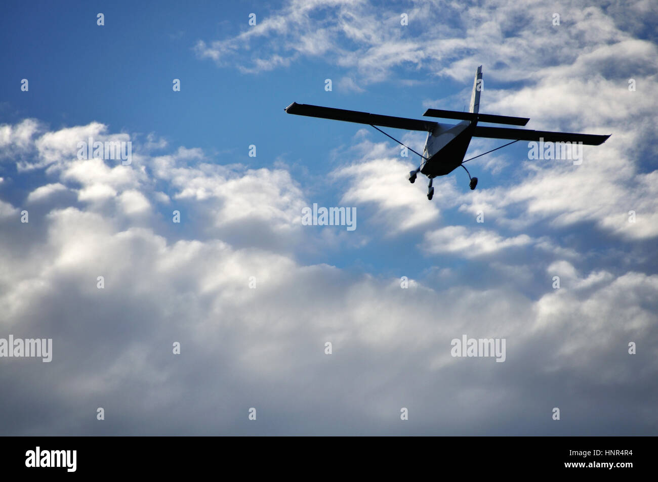 Small propeller plane flying in the sky hi-res stock photography and ...
