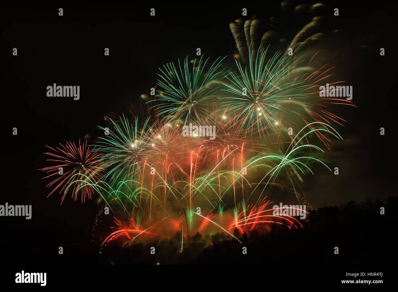 Great fireworks celebration of new year on dark night sky. Full of ...