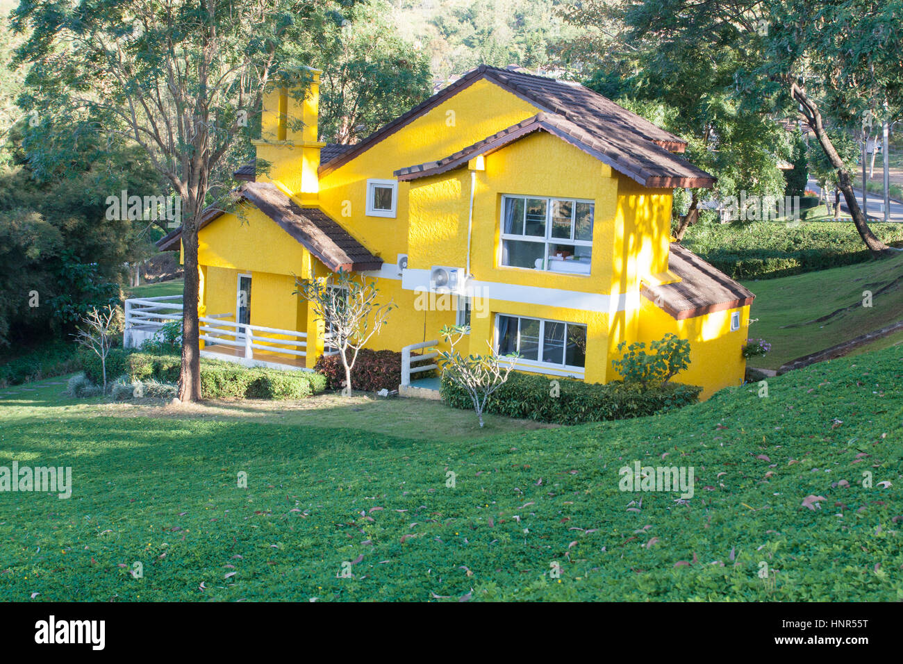 beautiful swiss mountain valley landscape with a yellow house Stock ...