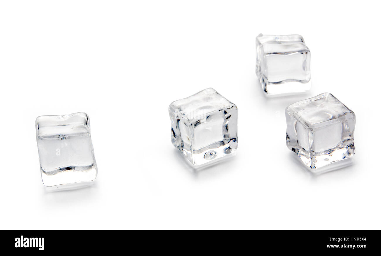 three ice cubes on white background Stock Photo - Alamy