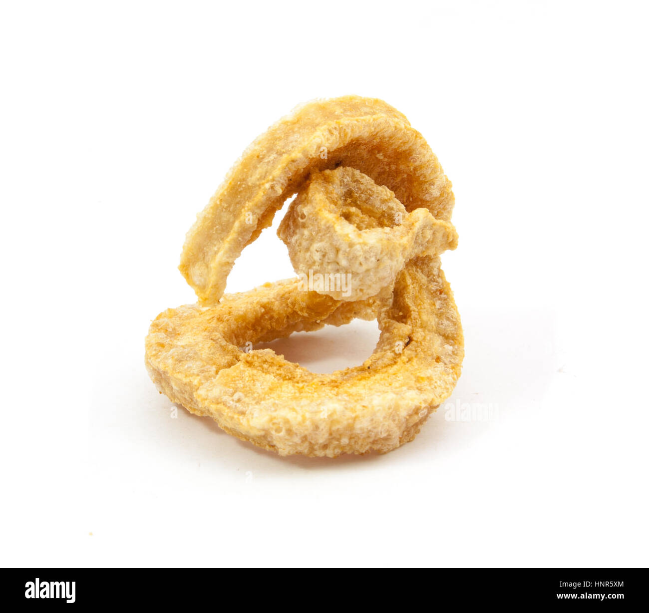 pork rind scratchings on white background Stock Photo - Alamy