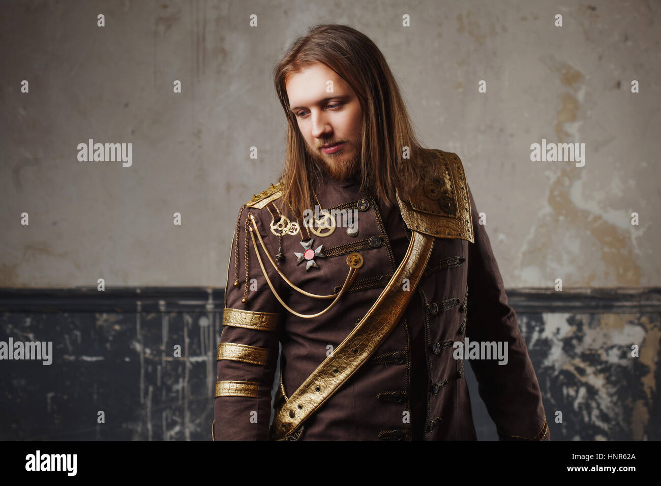 Handsome male Steam punk. Retro man in uniform, portrait over grunge ...