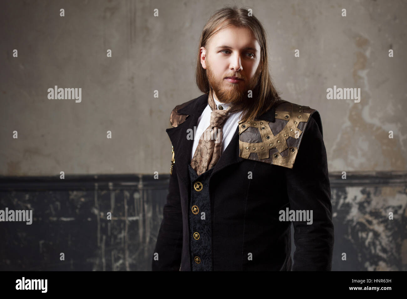 Handsome male Steam punk. Retro man in uniform, portrait over grunge ...