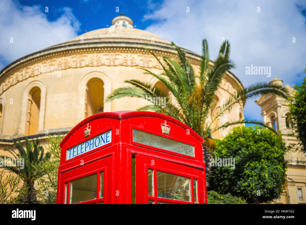 Mosta, Malta - Traditional British red telephone box with palm trees ...
