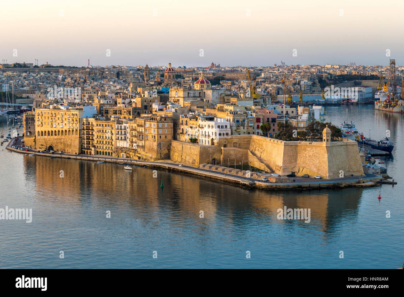 Senglea skyline view with Gardjola Gardens from Valletta early in the ...