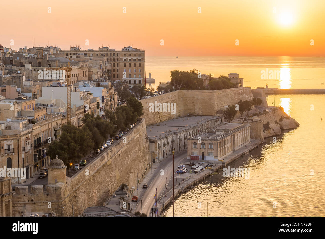 Valletta, Malta - Sunrise in Malta with the ancient wall of Valletta ...