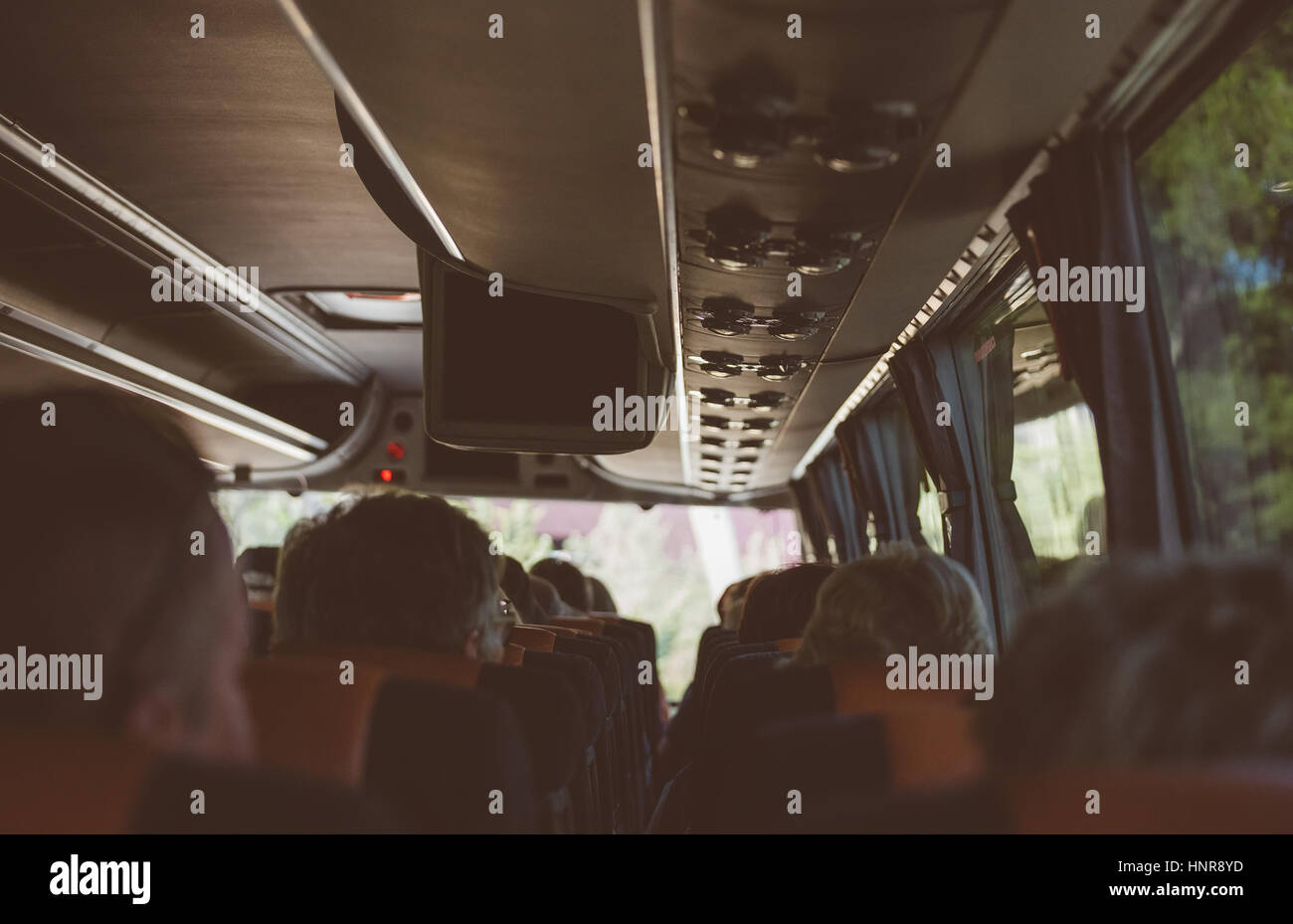 Bus passengers sitting window seat hi-res stock photography and images ...