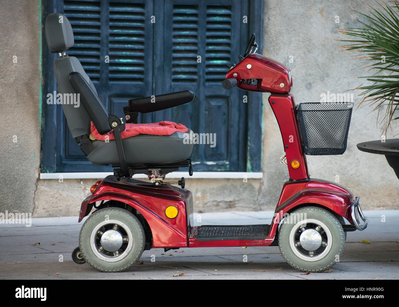 Motorized wheelchair car for disabled people Stock Photo - Alamy