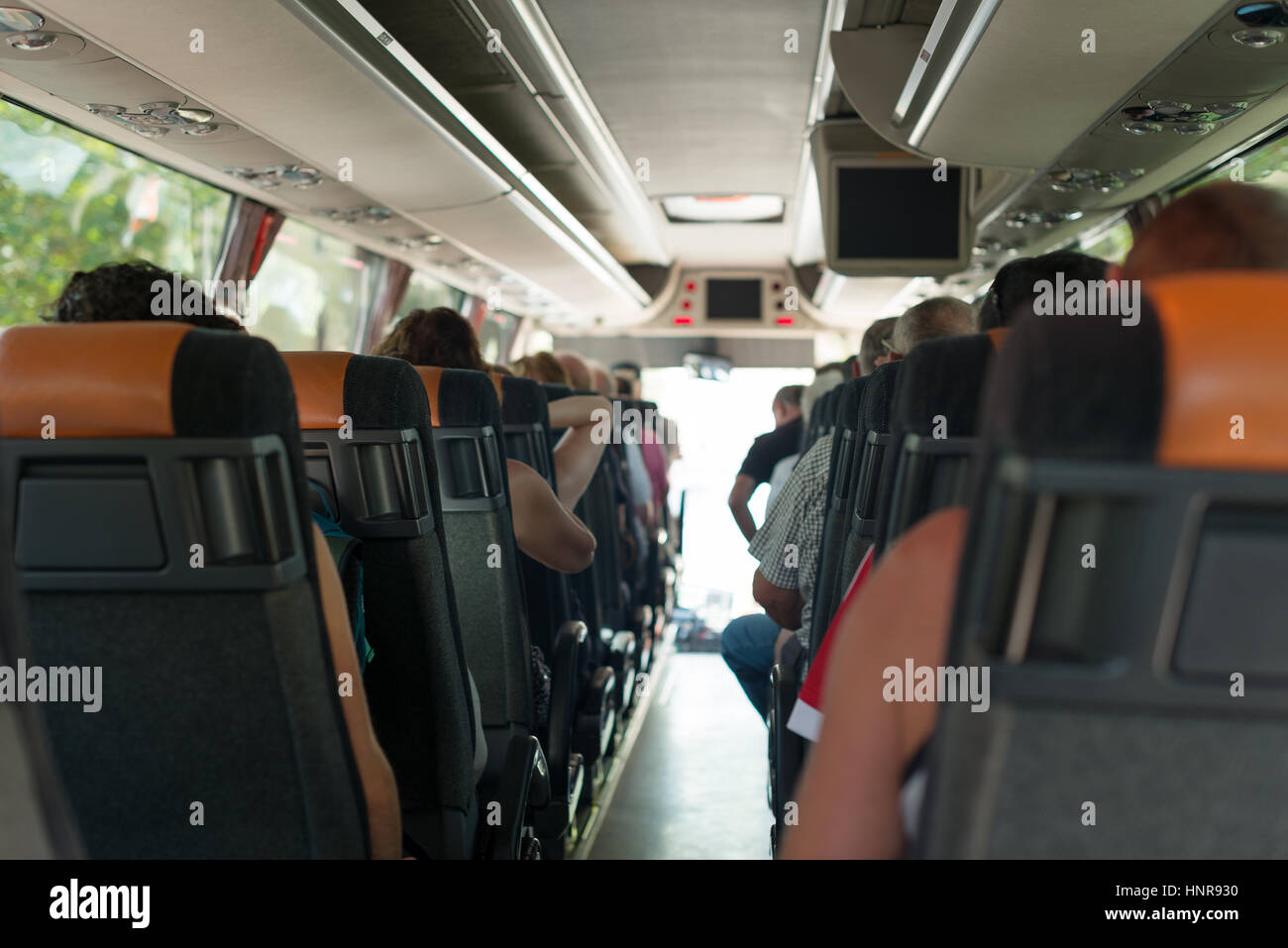 Bus passengers sitting window seat hi-res stock photography and images ...