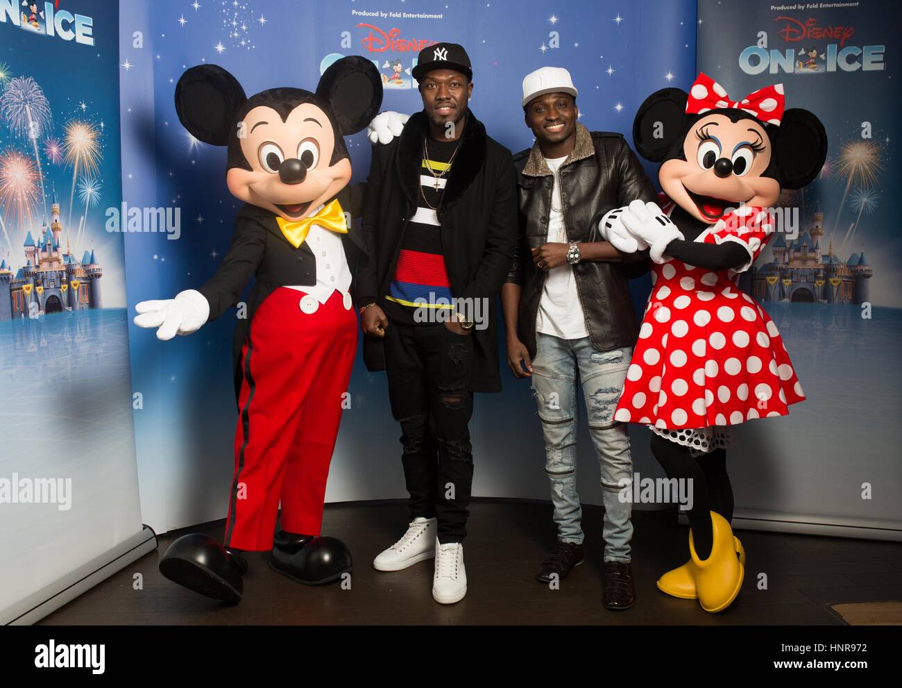 Reggie (left) and Bollie with Mickey Mouse and Minnie Mouse at the ...