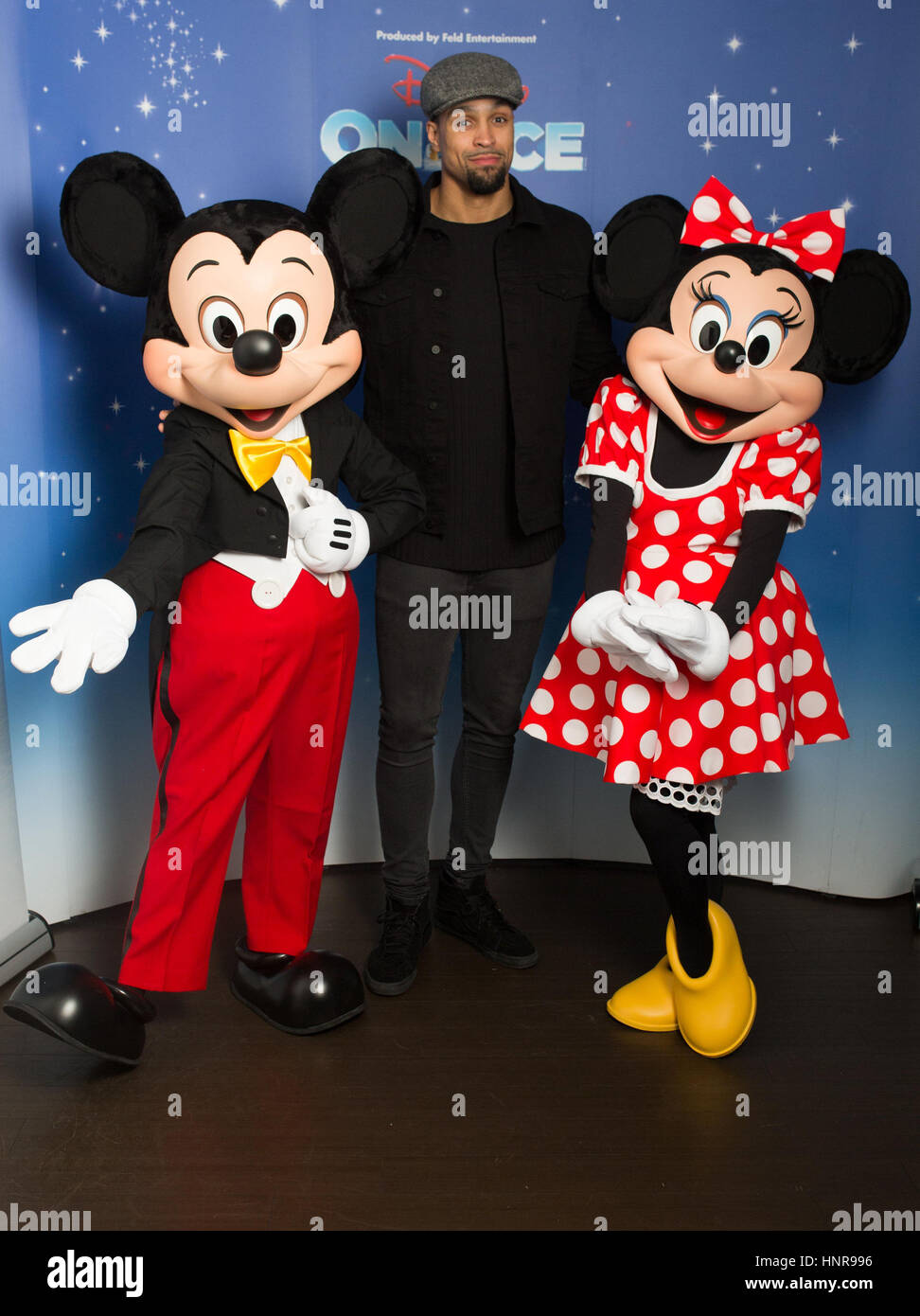 EDITORIAL USE ONLY Ashley Banjo with Mickey Mouse and Minnie Mouse at ...