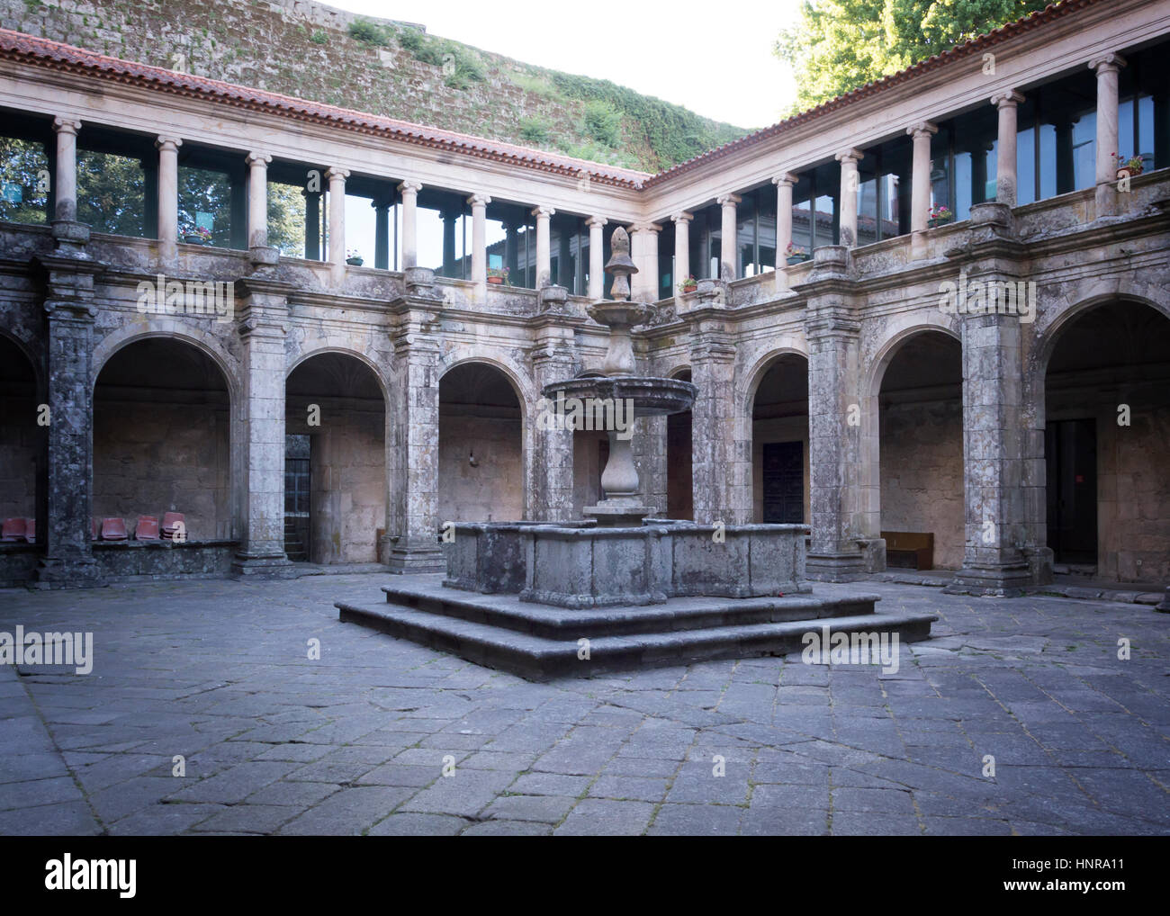 Square with fountain in an old medieval indoor garden dark atmosphere ...