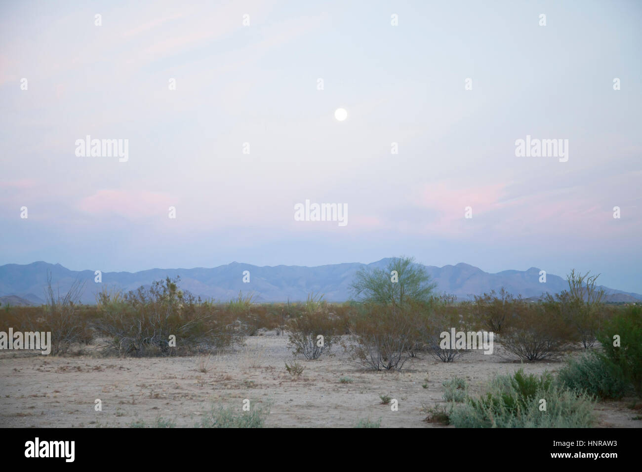 Hazy desert mountains in the distance at dusk Stock Photo - Alamy