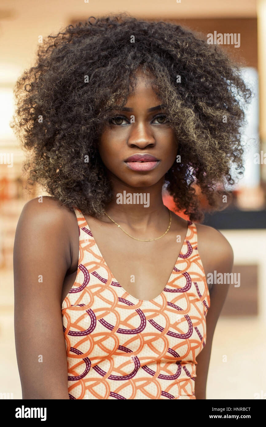Portrait of pretty afro-american girl with curly hair Stock Photo - Alamy