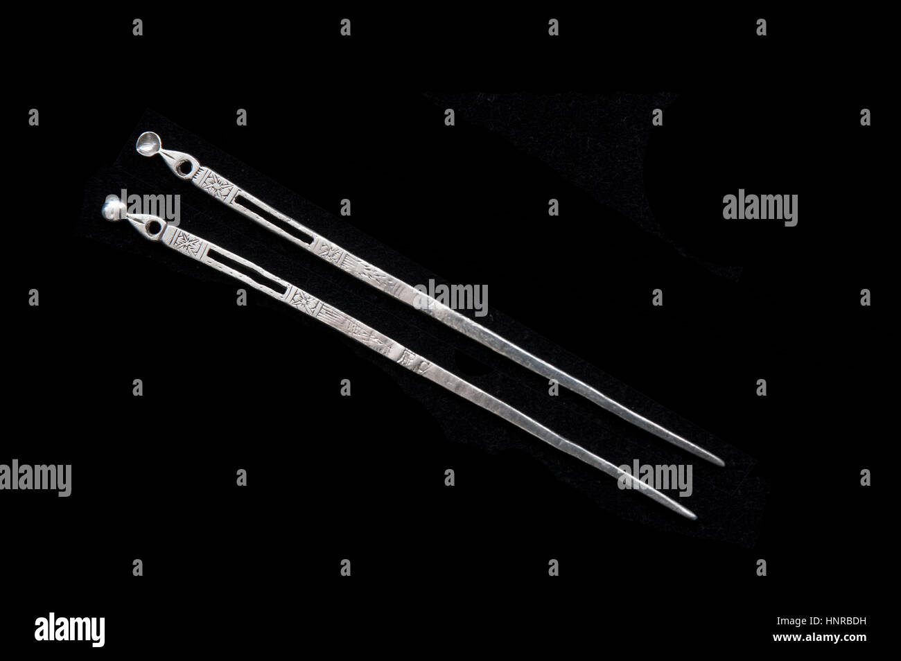 17th century Medieval silver earscoop and bodkin showing both sides ...