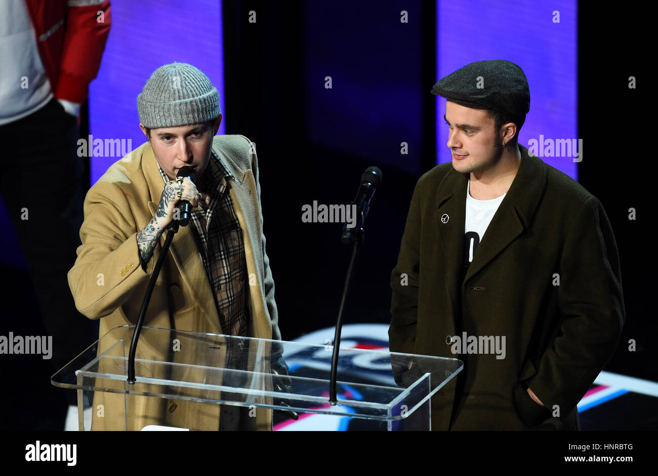 Laurie Vincent (left) and Isaac Holman of Slaves collect the award for ...