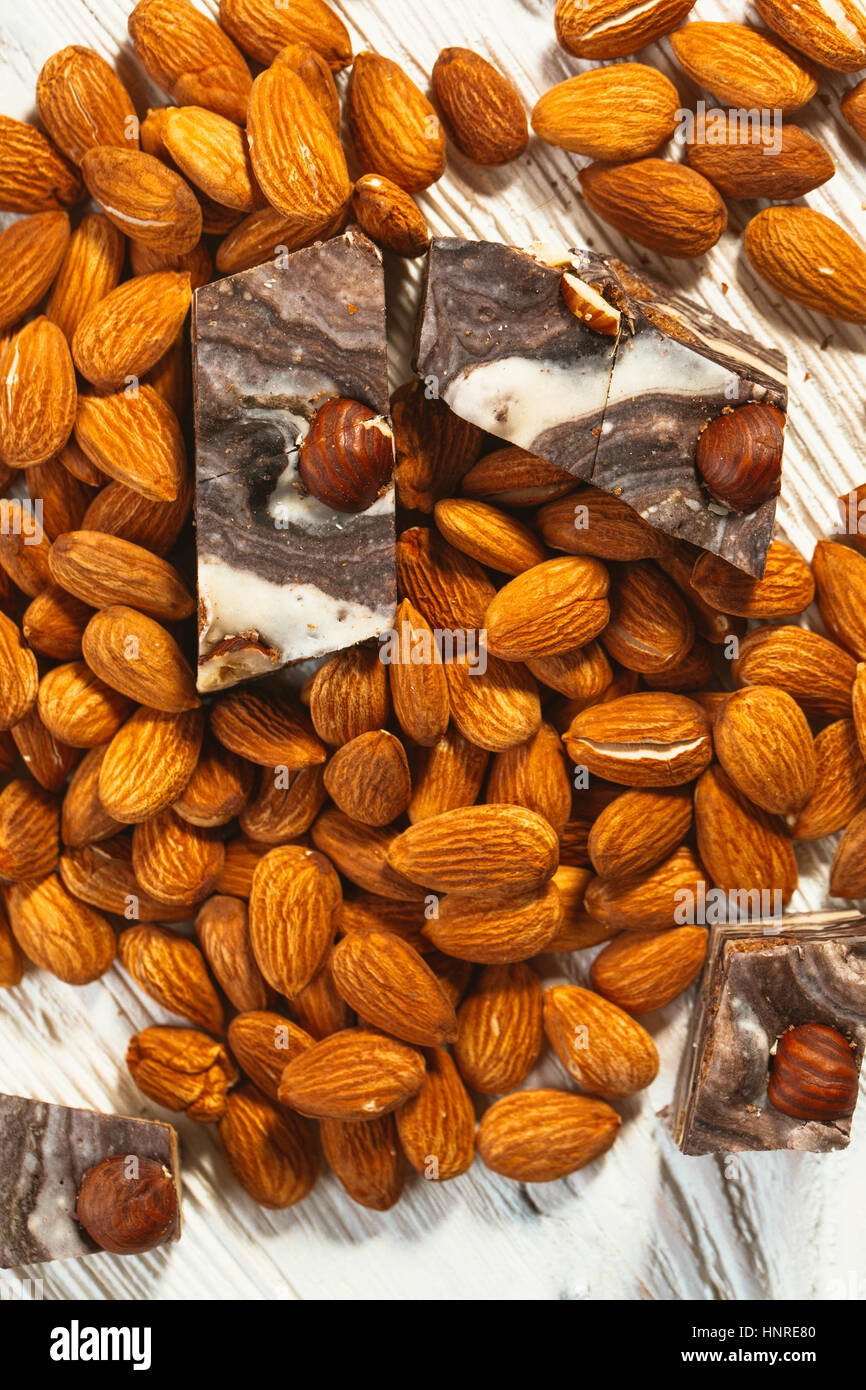 candy paste and almonds on white wooden background Stock Photo - Alamy