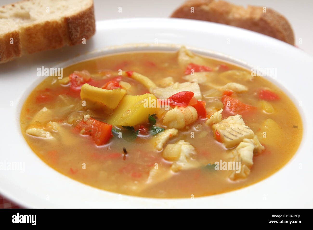 fish soup with baguette Stock Photo - Alamy