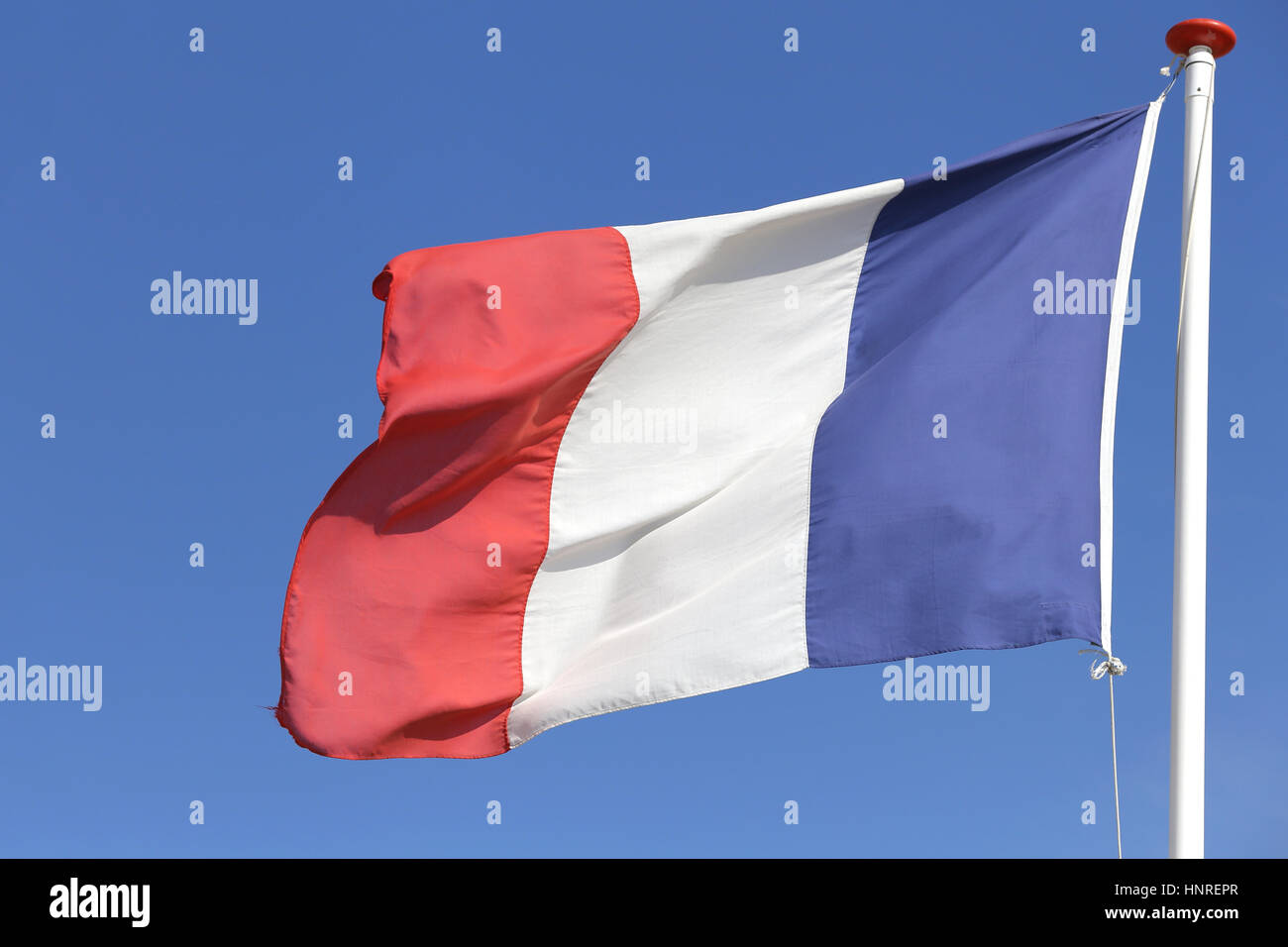 French flag flying in the wind Stock Photo - Alamy