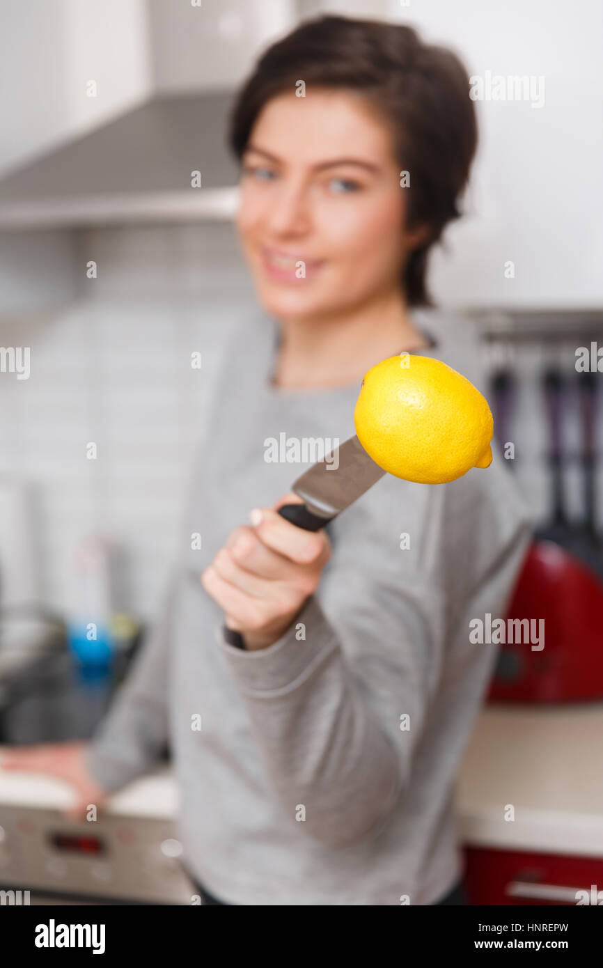 Brunette woman standing at the curtain hi-res stock photography and images - Alamy