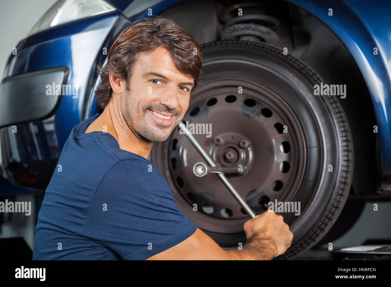 Mechanic fixing car hi-res stock photography and images - Alamy