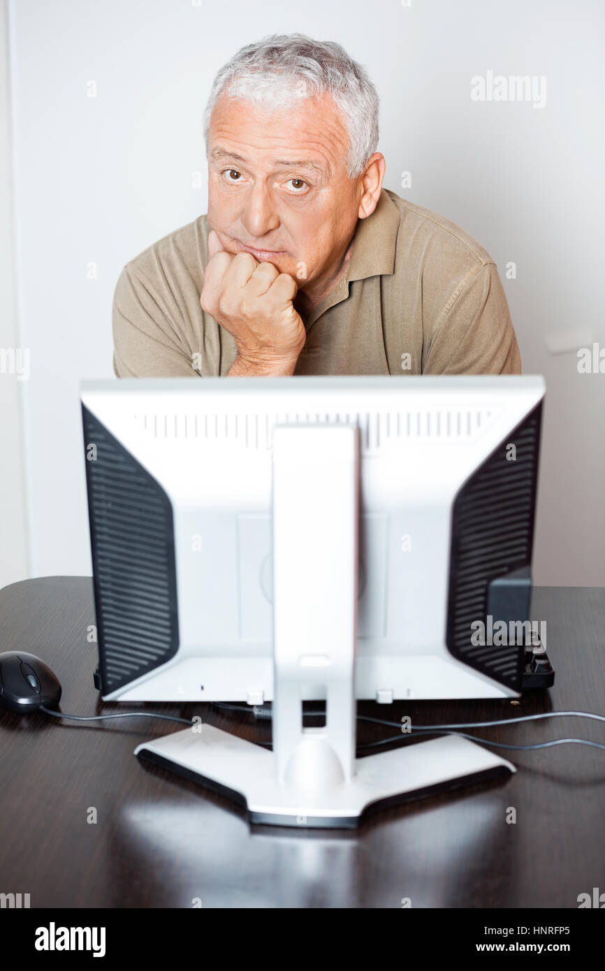 Old chin man sitting in hi-res stock photography and images - Alamy