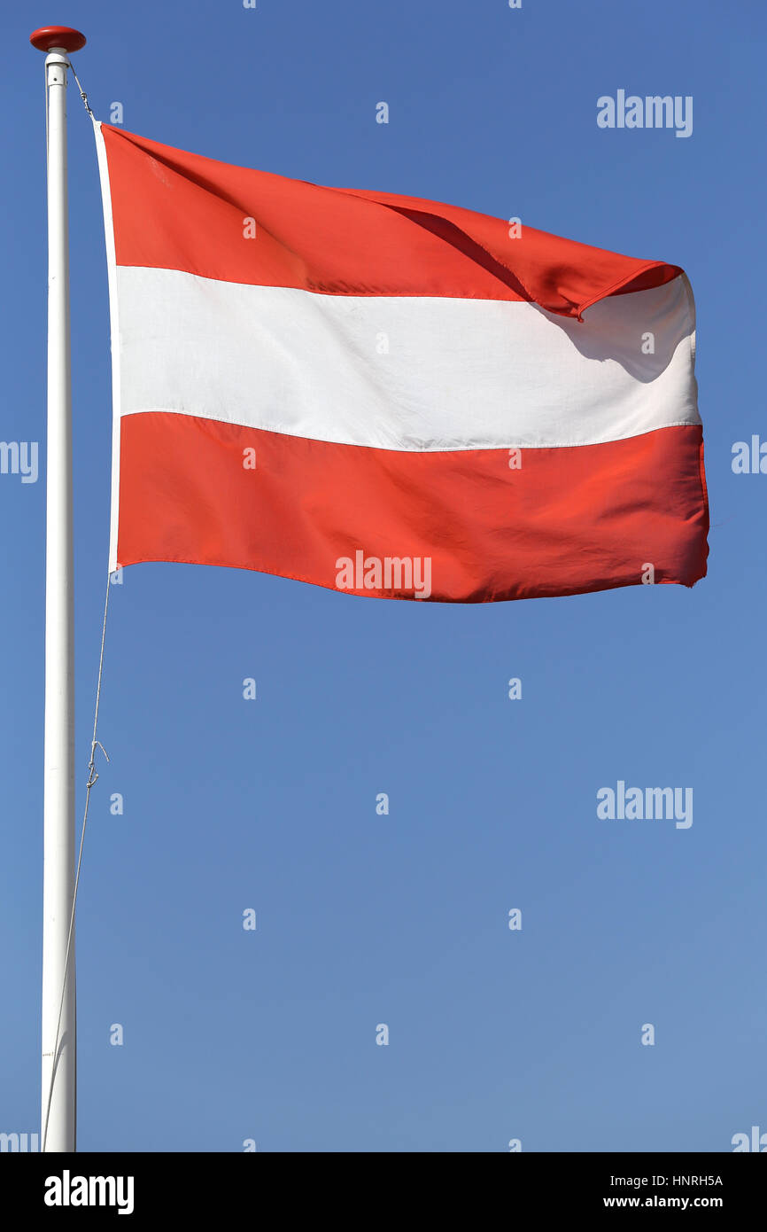 Austrian flag flying in the wind Stock Photo - Alamy