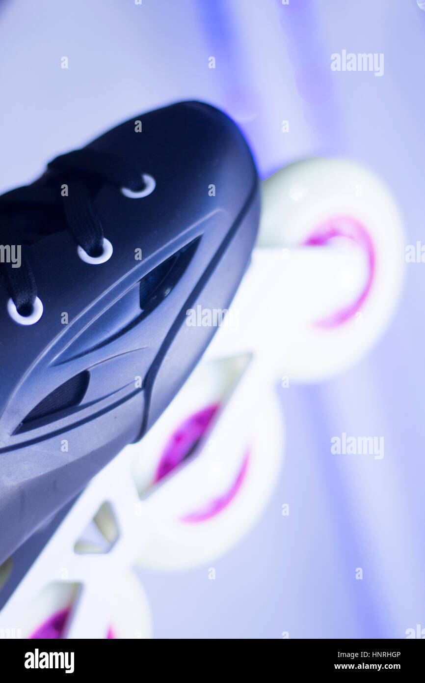 Freestyle inline skates boots and wheels in retail store shop window ...