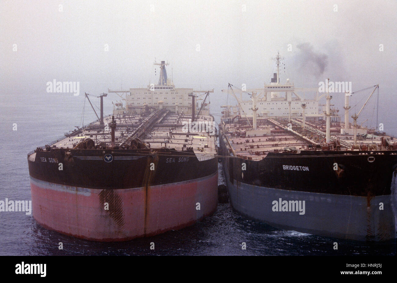The crippled oil supertanker Bridgeton unloading its hold of oil to ...
