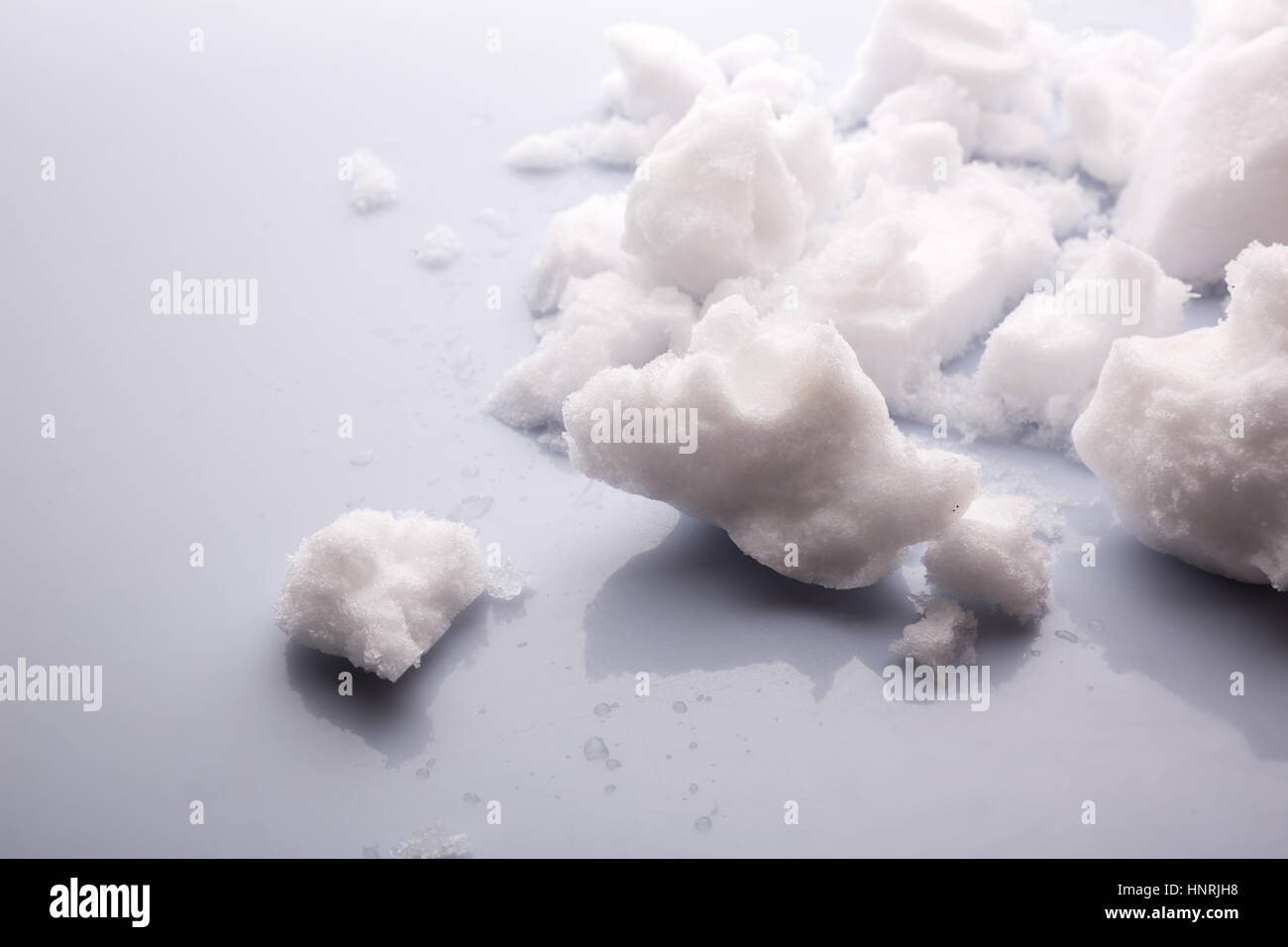 Chunks of clean melting snow, macro. Snowy background or closeup Stock ...