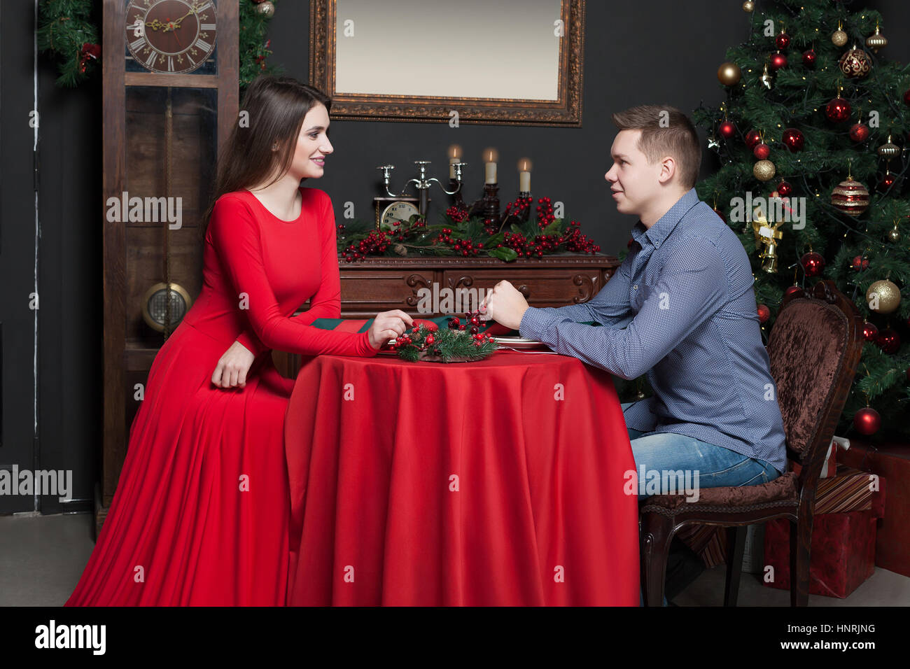 Young smiling couple at luxury restaurant. Romantic date, man and woman ...