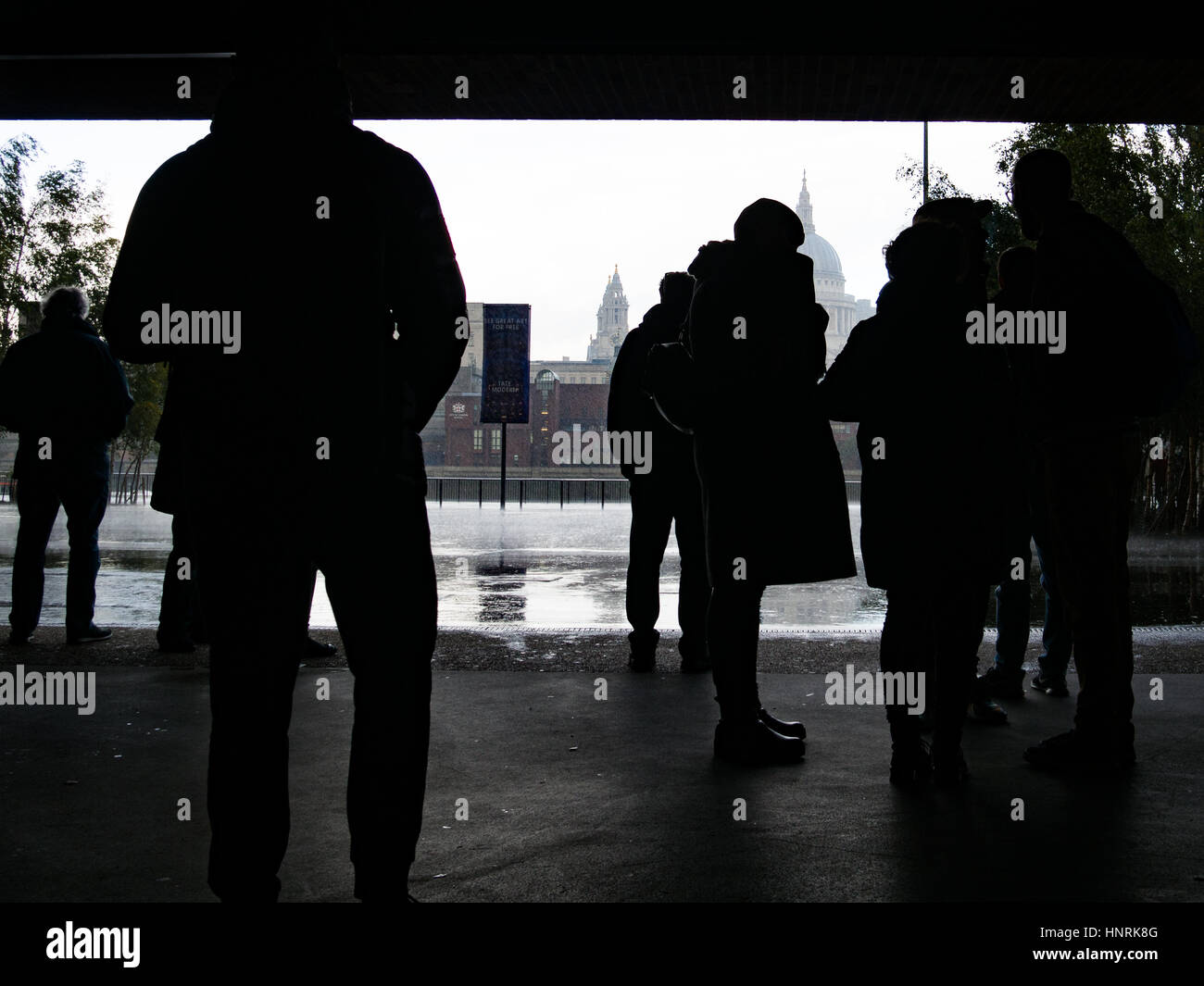 Sheltering from rain hi-res stock photography and images - Alamy