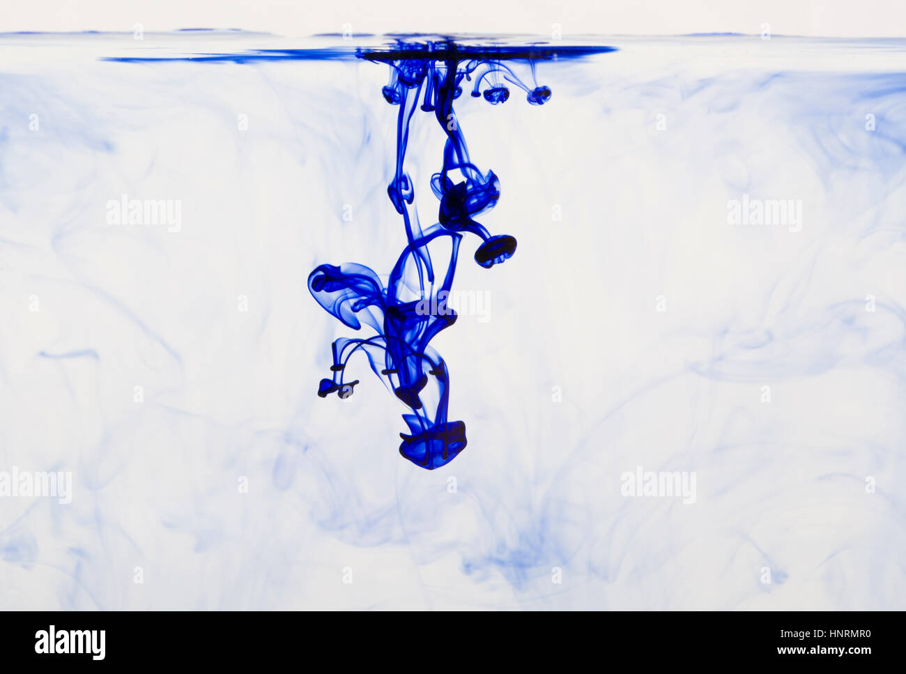 Abstract image of ink flowing in water to make an interesting and ...