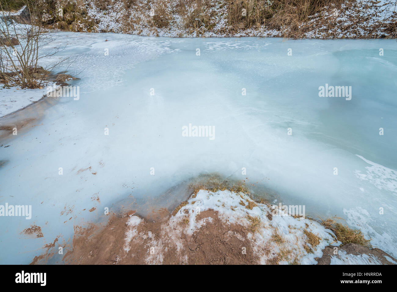 frozen brook in the forest in the mountains Stock Photo - Alamy