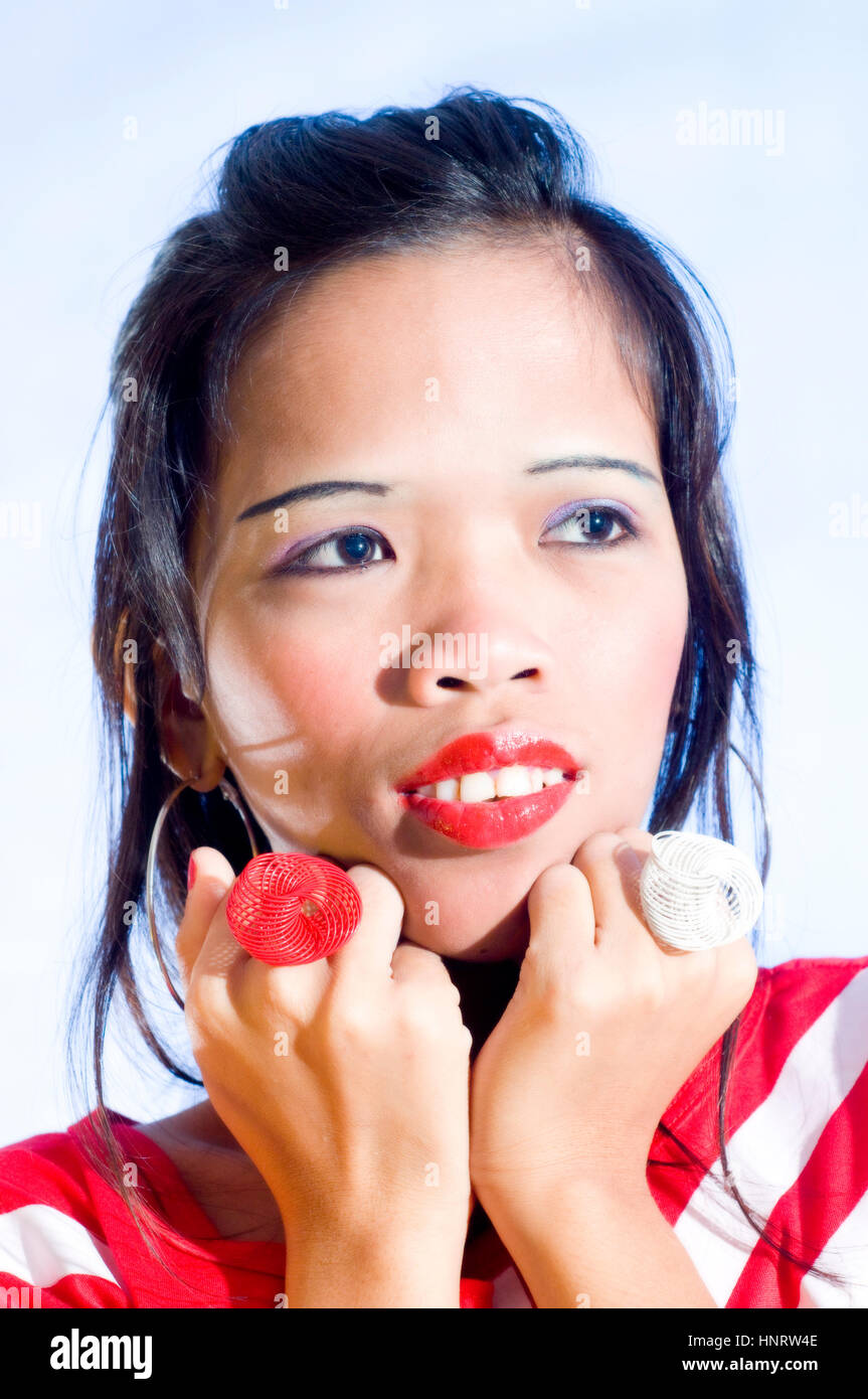 Young woman studio setting hi-res stock photography and images - Alamy