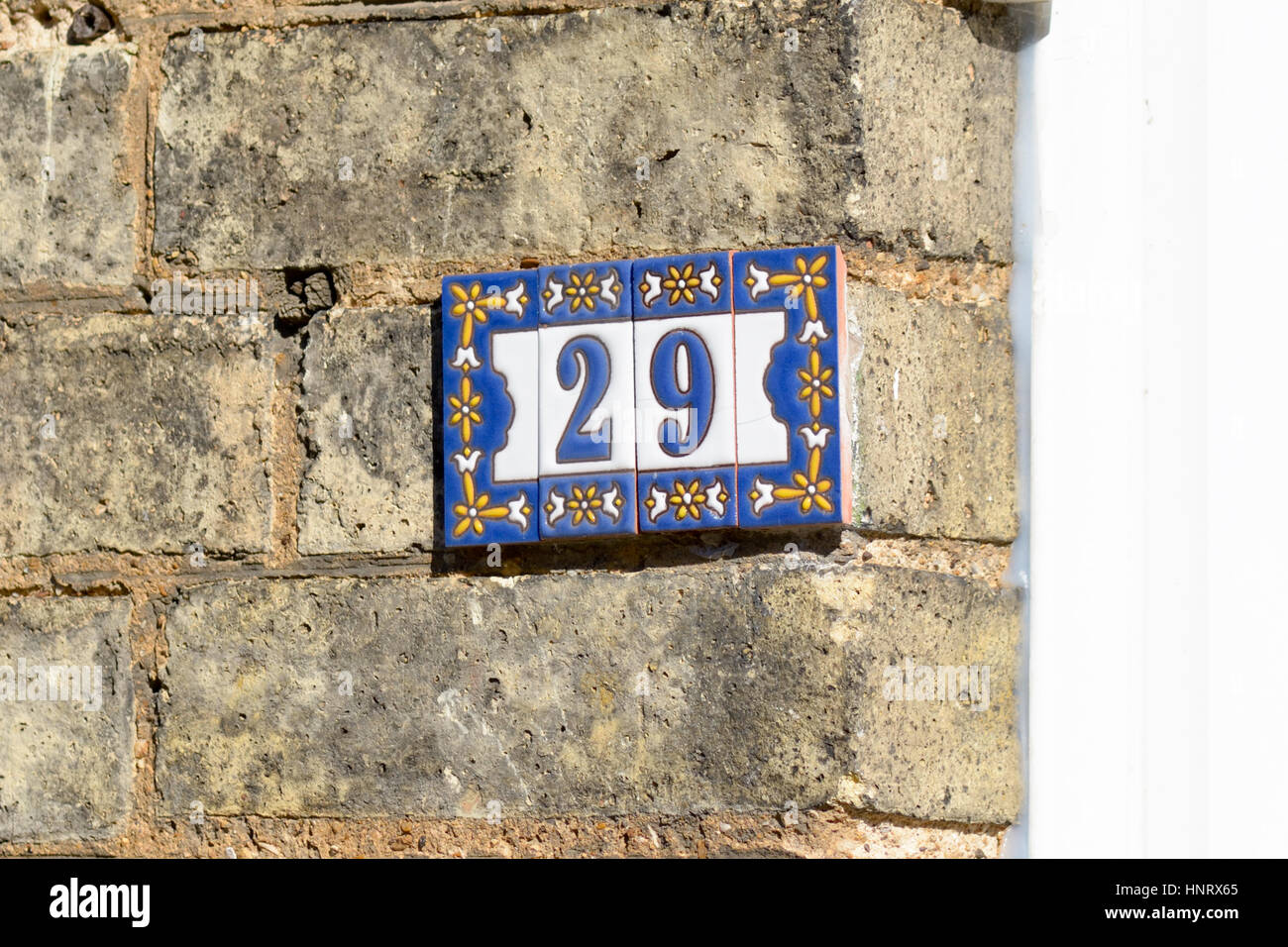House number 29 sign on wall Stock Photo - Alamy